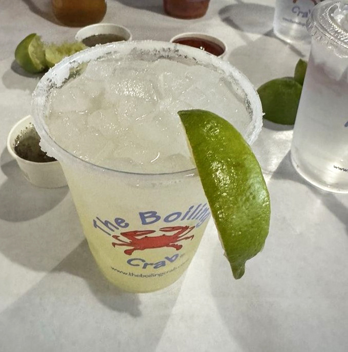 A margarita with lime garnish and salt rim serves as essential firefighting equipment when you've overestimated your spice tolerance.