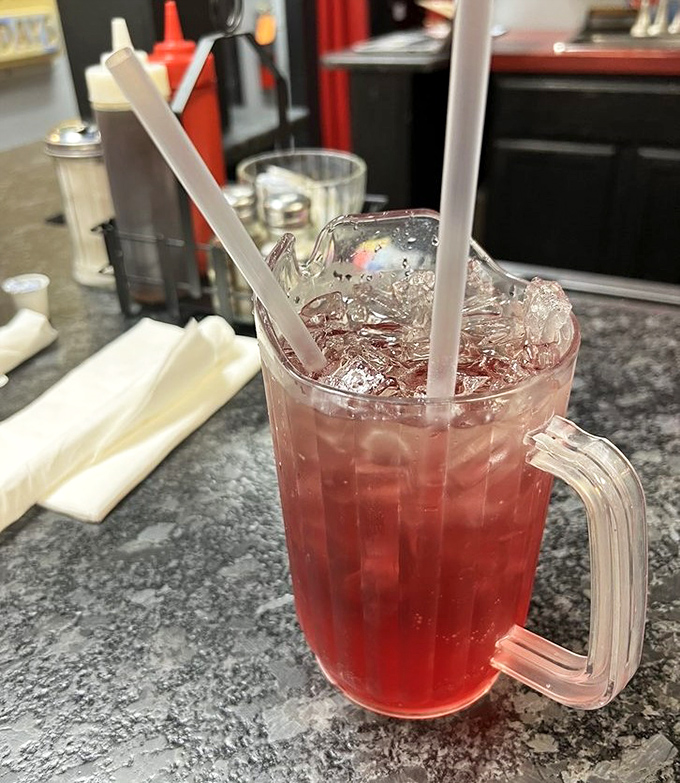 Ice-cold drinks in proper diner glassware complete the authentic breakfast experience – refills flow as freely as conversation here.
