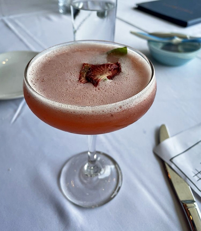 This isn't just a cocktail&mdash;it's a sunset in a glass, complete with the kind of foam that Instagram was invented for.