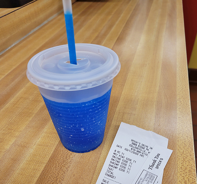 Even the drinks at Speck's come with a side of nostalgia &ndash; that vibrant blue slushie is the exact color of summer vacation memories.