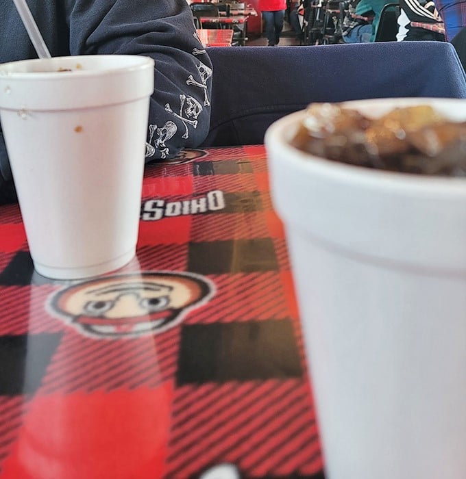 Even the tabletops celebrate Buckeye spirit with their red and black checkered pattern – the perfect backdrop for comfort food classics.