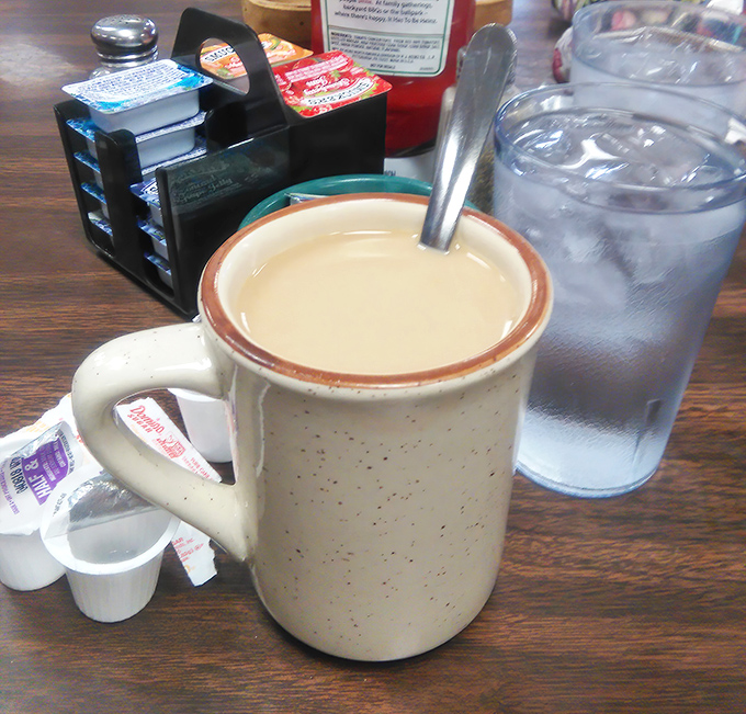 The classic diner mug&mdash;speckled, sturdy, and filled with coffee that somehow tastes better than what you brew at home. The true unsung hero of breakfast culture.