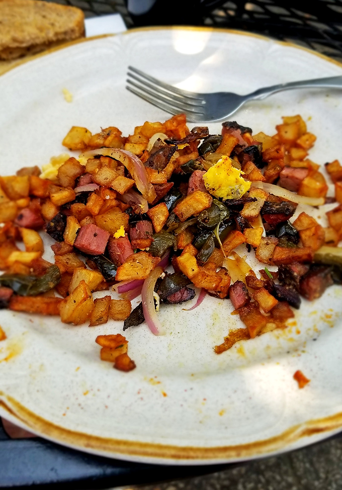 Breakfast hash that looks like it was constructed by someone who understands that mornings deserve more than just cereal and regret.