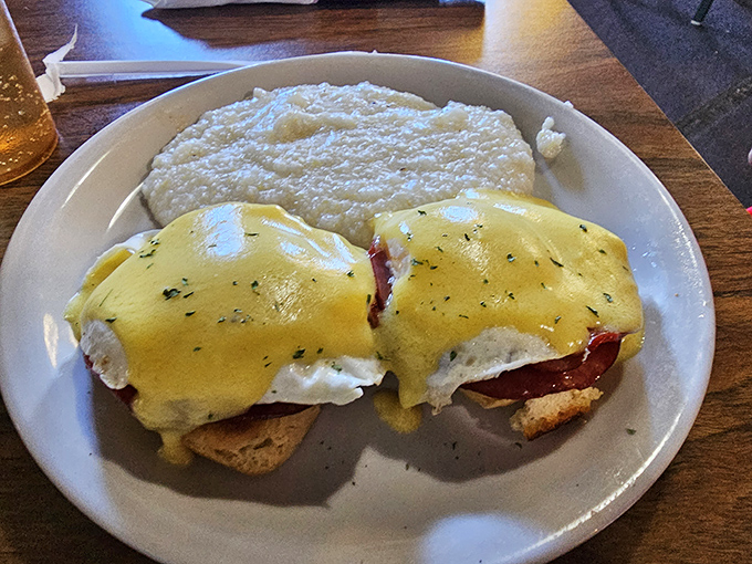 Classic eggs benedict with a side of grits that would make any Southerner nod in approval. The hollandaise sauce looks like liquid sunshine on a cloudy day.