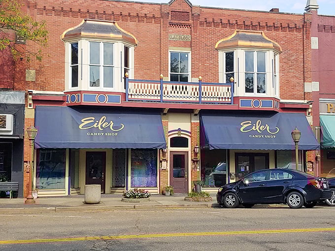 Eiler Candy Shop's storefront promises sweet treasures within. Those bay windows have tempted passersby with chocolate displays since long before smartphones existed.