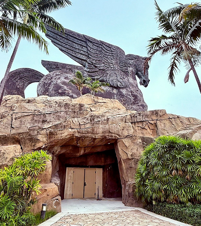 Knock knock. "Who's there?" "Just a casual entrance built into the base of a massive mythological statue."