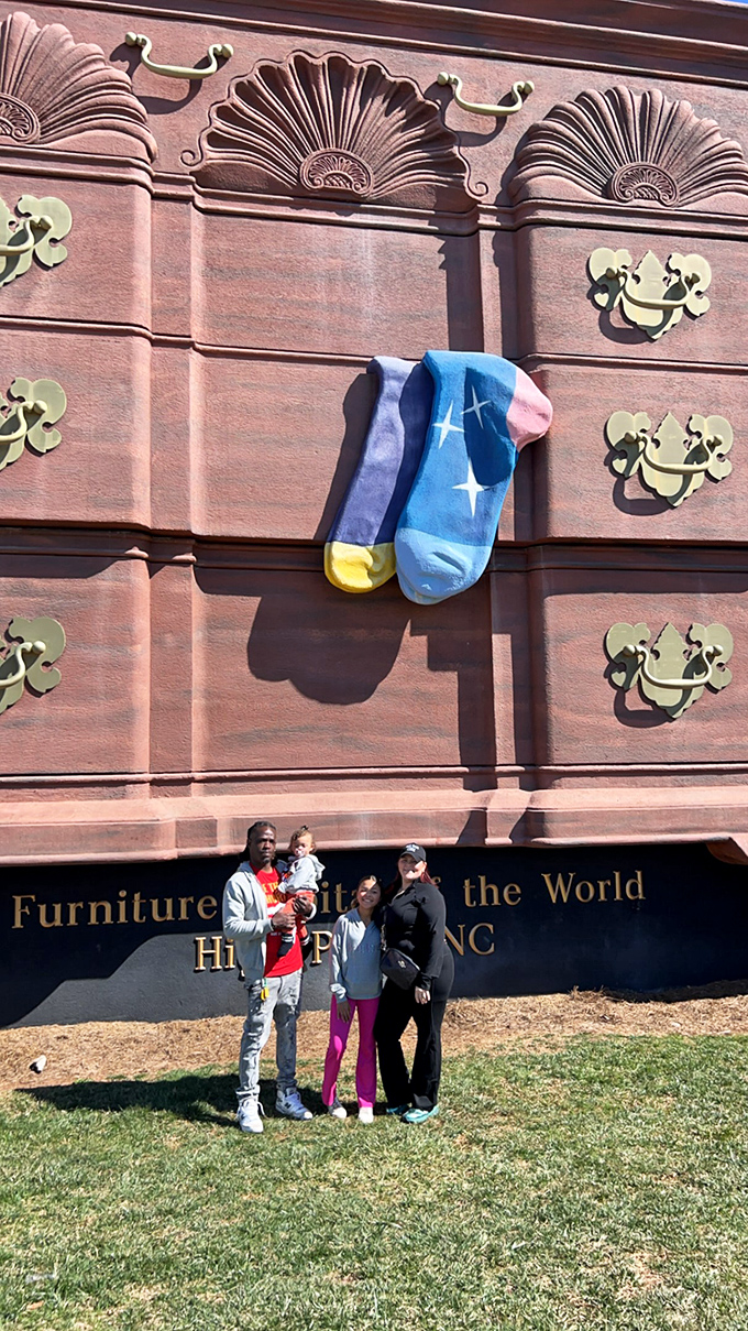 Family photos take on new meaning when your backdrop is a building-sized bureau. Future generations will have questions.