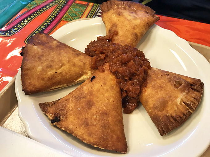 Golden fried fataya pastries filled with seasoned meat: Africa's answer to empanadas, and arguably doing it even better.