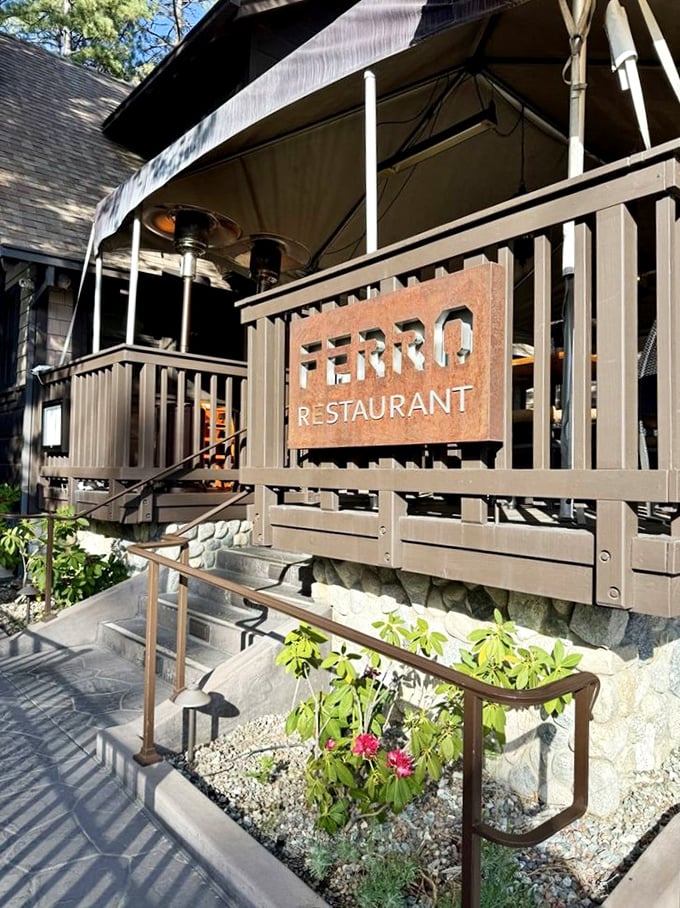 Ferro's outdoor dining area beckons with rustic elegance. The perfect spot to contemplate life's big questions, like "Should I order dessert?" (Yes, always yes.)