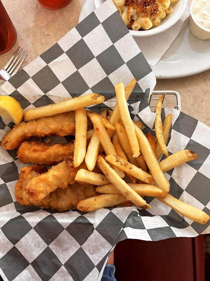 Golden-battered fish nestled among perfectly crisp fries&mdash;the kind of basket that makes you temporarily forget that vegetables exist.