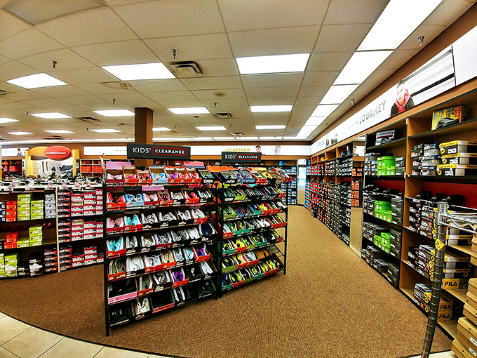 The shoe section: where practical intentions go to die. You came for sensible walking shoes but those checkered Vans are speaking to your inner teenager who still thinks you could skateboard.