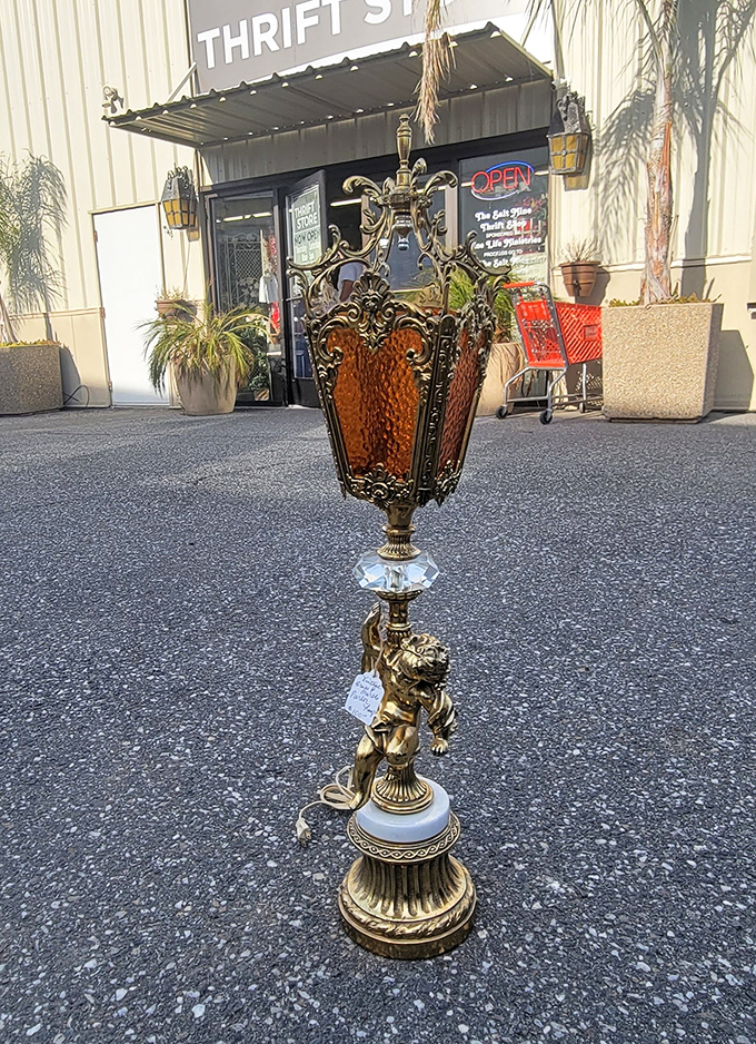 Not just a lamp&mdash;a conversation piece! This ornate cherub creation is what happens when baroque meets electricity with dramatic flair.