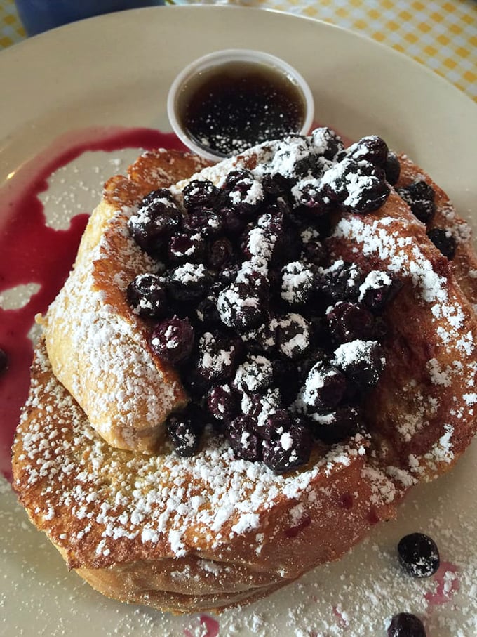 French toast that's had a blueberry epiphany&mdash;dusted with powdered sugar and looking like it belongs on the cover of Breakfast Monthly.