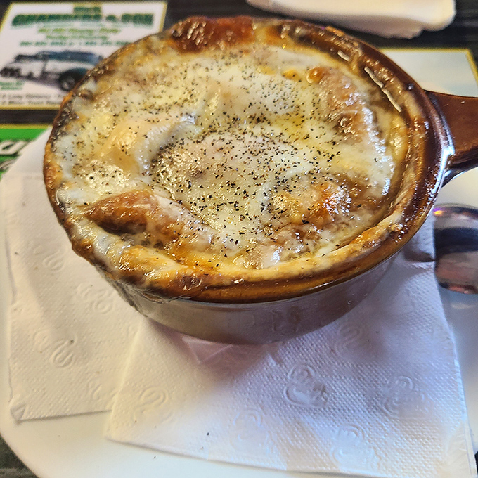 French onion soup done right is like a warm hug for your taste buds. That golden, bubbling cheese cap hides a rich broth that's worth every potential chin burn.