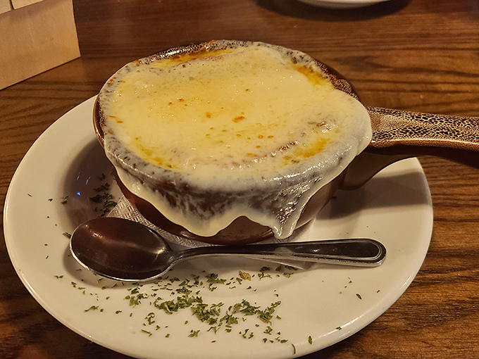 This French onion soup's crown of bubbling, golden cheese threatens to steal the show from the steaks &ndash; a supporting actor gunning for the Oscar.