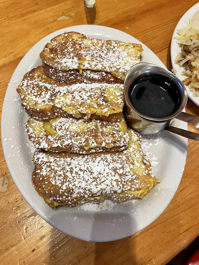 French toast dusted with powdered sugar and served with syrup&mdash;breakfast royalty has officially entered the dining room. 