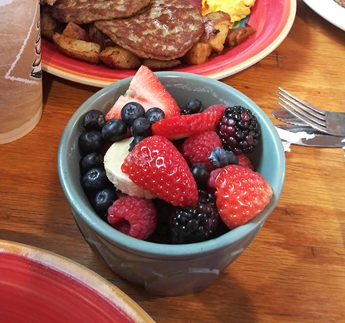 A fruit bowl that doesn't apologize for being healthy. These berries look like they were picked this morning and arranged with love.