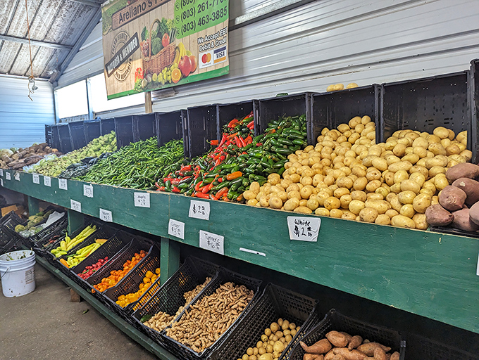 Farm-fresh bounty at Arellano's Produce stand offers a colorful array of peppers, potatoes and vegetables straight from local soil.