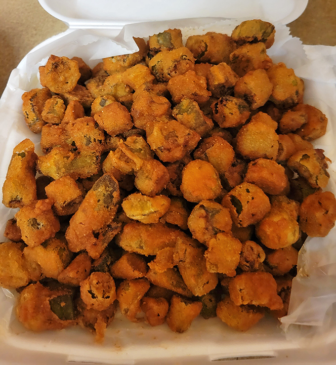 Fried okra so perfectly golden and crispy, it could make a vegetable skeptic reconsider their entire worldview.