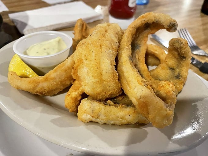 Golden-battered fish so crispy you can hear the crunch from three tables away &ndash; lake-to-plate perfection.