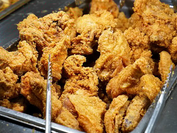 Fried chicken so perfectly golden, it deserves its own trophy case in the Southern Food Hall of Fame.