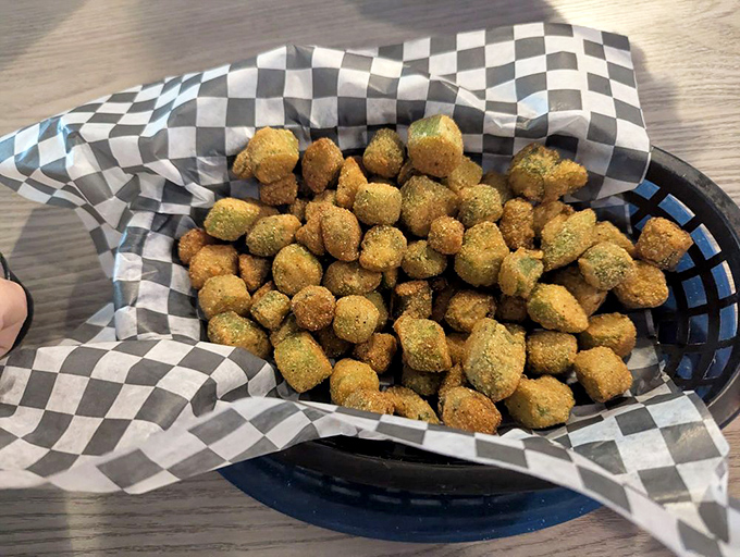 Fried okra that solves the eternal okra equation: crispy exterior, tender interior, zero slime. Southern mathematics at its finest.