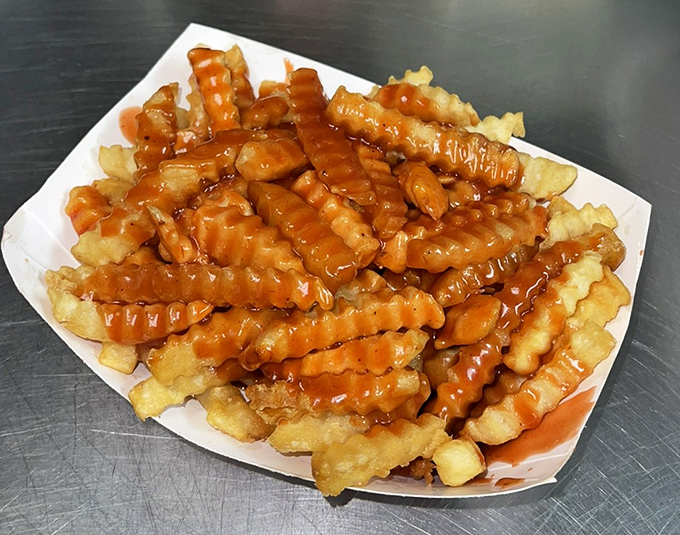 Gravy-drenched crinkle-cut fries that make you wonder why you ever bothered with ketchup&mdash;the perfect vehicle for sopping up every last drop.