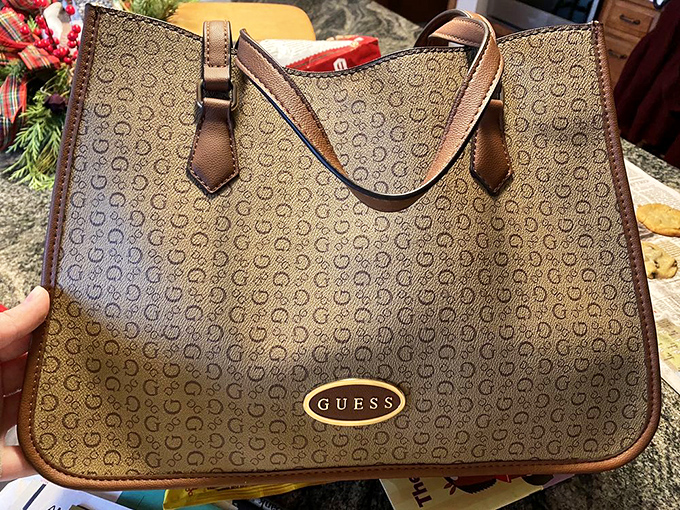 A Guess bag that whispers "designer" without shouting about your credit card balance.
