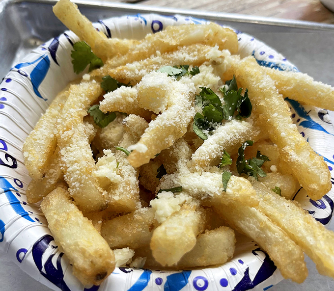 These aren't just garlic fries; they're supporting characters deserving of their own spinoff show in the meal's delicious ensemble cast.