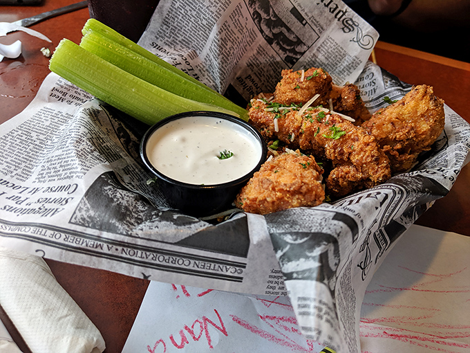Newspaper-lined baskets of golden-fried goodness&mdash;proof that sometimes the best things in life come disguised as humble chicken wings.