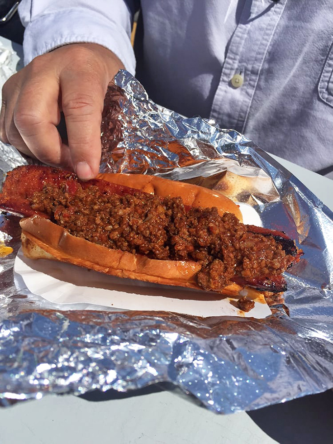 The Georgia Hot &ndash; where New England meets Southern heat in a perfectly grilled hot dog topped with spicy meat sauce.