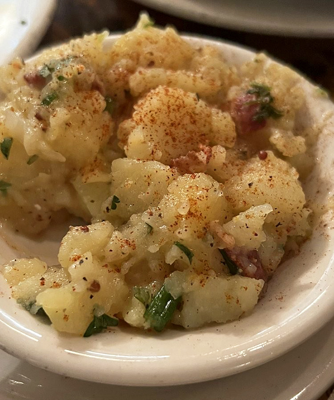 German potato salad that makes you question everything you thought you knew about picnic sides. Warm, bacon-studded rebellion.