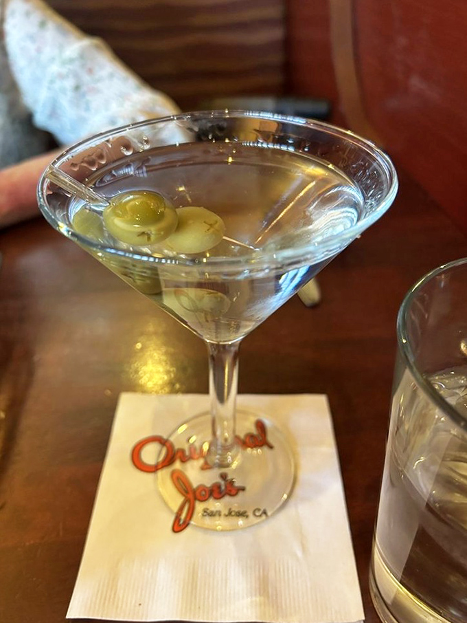 A properly made martini is civilization in a glass &ndash; three olives standing at attention like they know they're part of something important.