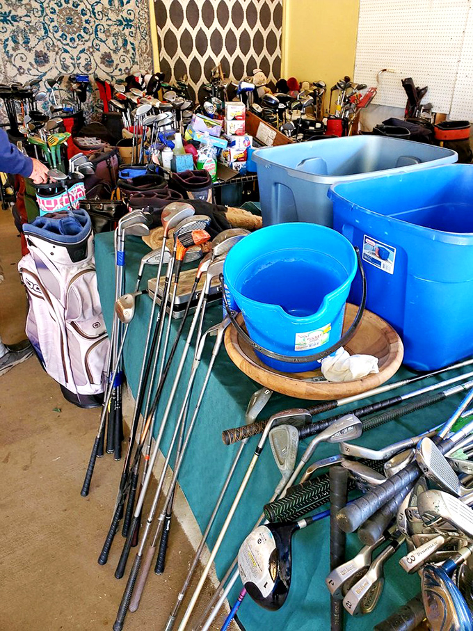 Golf club paradise where duffers dream of fairways while their spouses calculate how many more clubs could possibly fit in the garage.