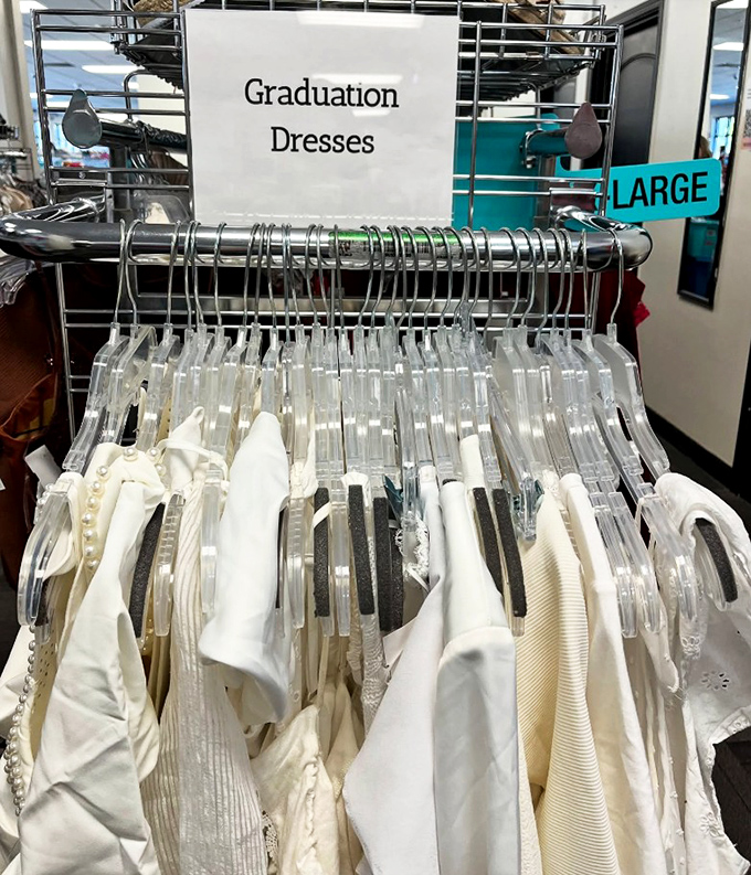 The graduation dress rack&mdash;where "Pomp and Circumstance" meets "I got this for how much?" White dresses with futures as bright as their new owners.