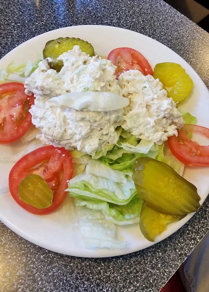 A Greek salad that proves vegetables can visit diners too, offering a crisp reprieve from the delicious parade of breakfast indulgences.