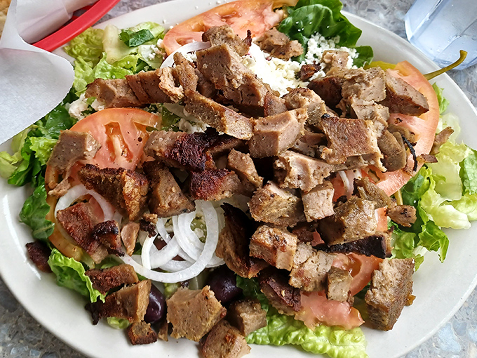 A Greek salad that doesn't skimp on the good stuff &ndash; generous feta, plump tomatoes, and enough gyro meat to make you forget you ordered something healthy.