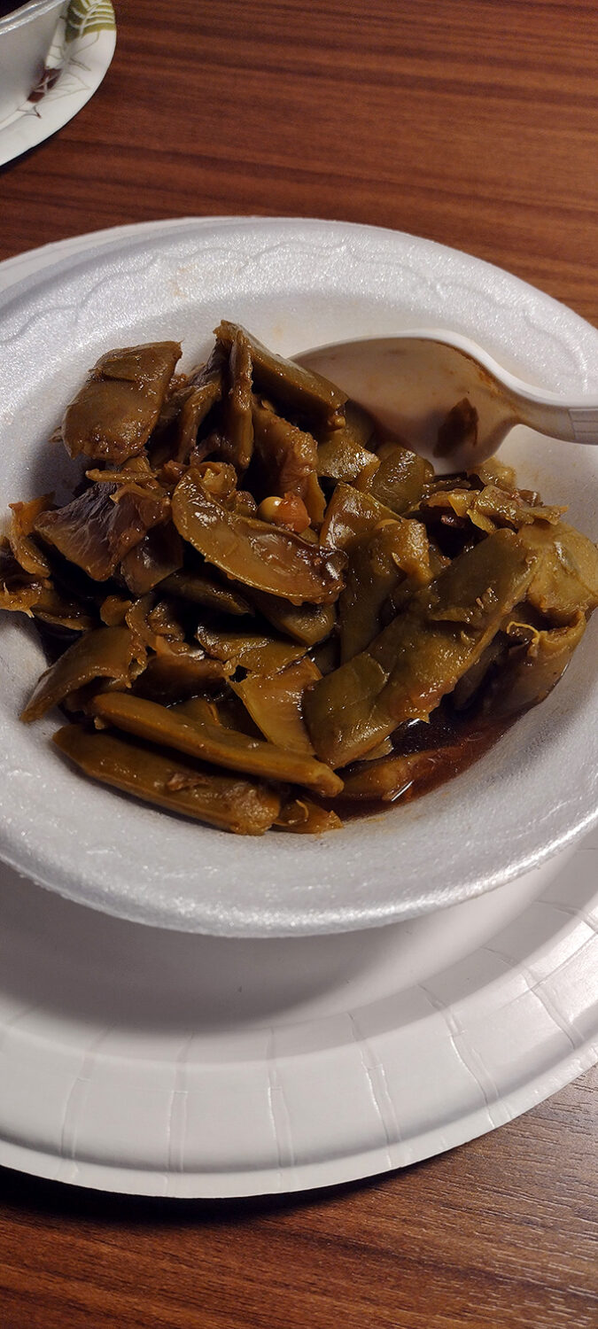 Southern-style green beans that have clearly been introduced to pork somewhere along their journey. Vegetables that don't apologize for being delicious.