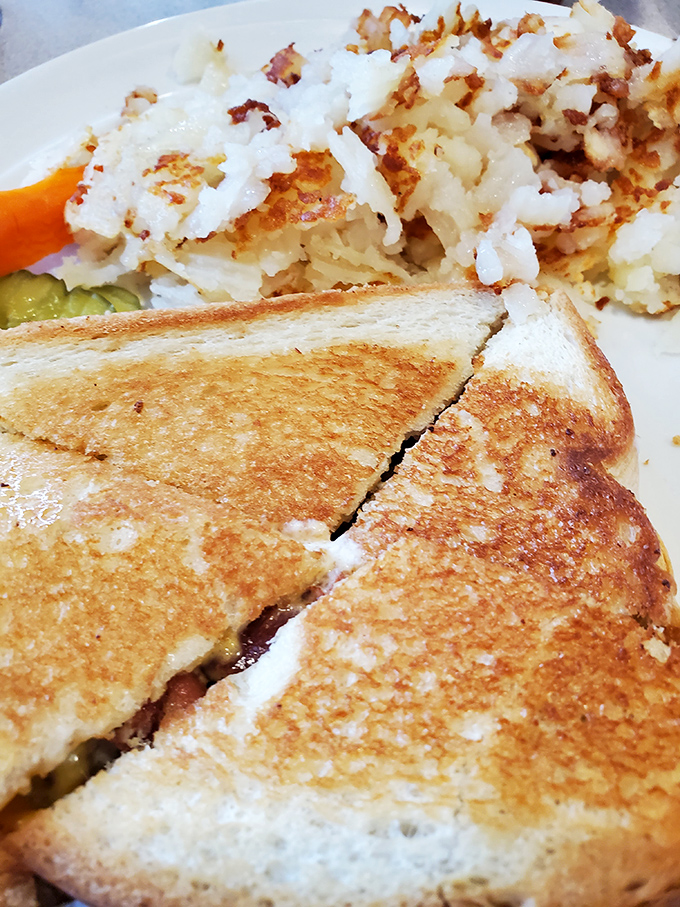 Grilled cheese and hash browns smothered in gravy&mdash;because sometimes simple comfort food is the most profound experience available.