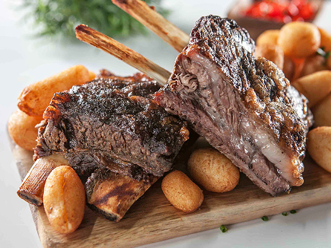 These beef ribs don't just fall off the bone&mdash;they practically leap onto your fork, begging to be devoured alongside those plump little cheese rolls.