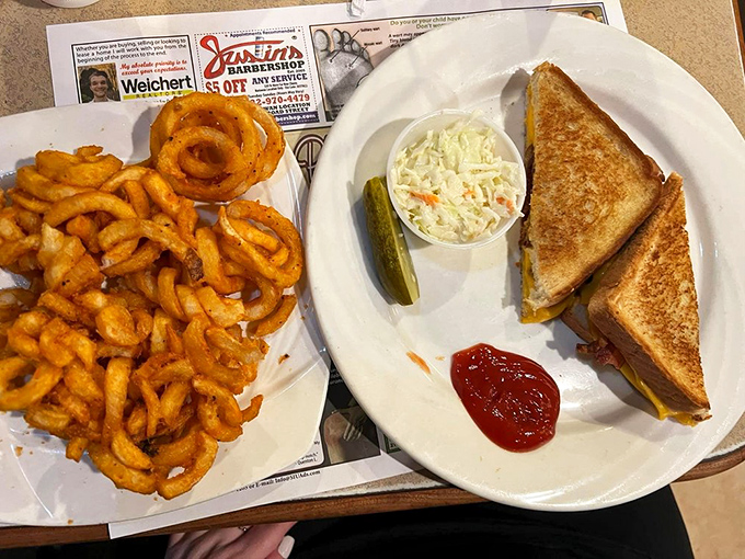 The grilled cheese and curly fries combo &ndash; proof that sometimes the simplest pleasures are the most satisfying. Childhood nostalgia on a plate.