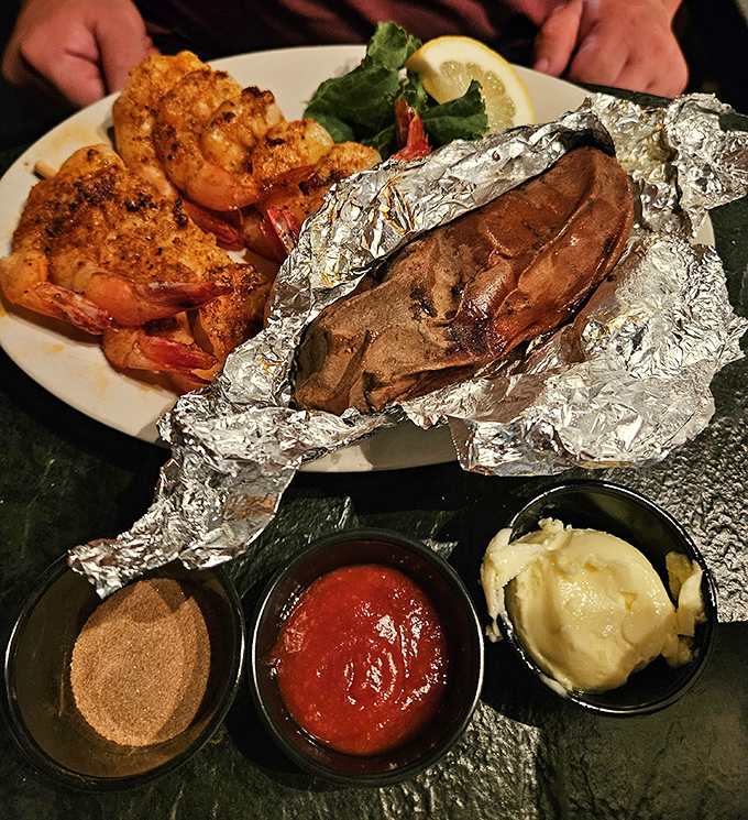 Grilled shrimp and a foil-wrapped potato&mdash;a simple combination elevated to art form through perfect seasoning and timing, like a culinary haiku.