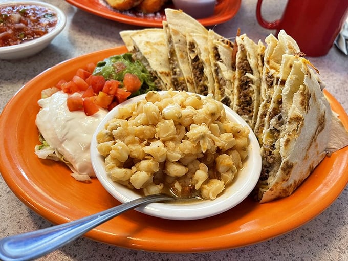 Ground beef quesadillas arrive golden and generous, with posole providing the perfect warming sidekick for your meal.