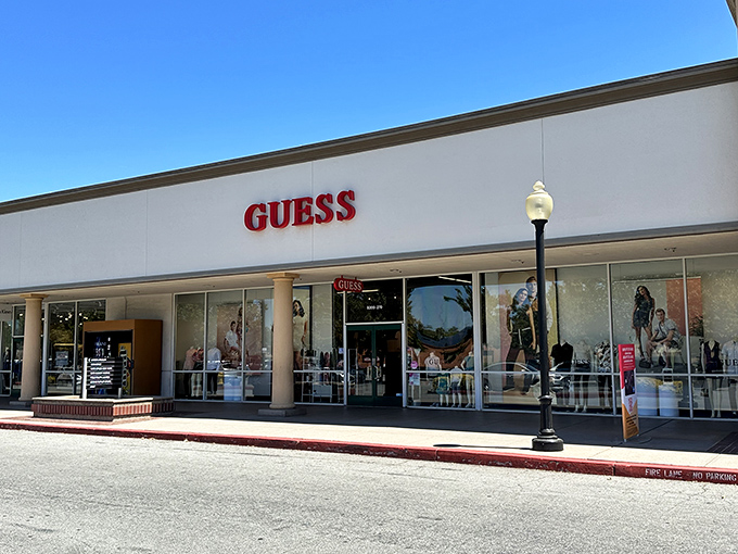 The clean lines and bright displays of Guess Factory beckon shoppers with denim dreams and logo aspirations.