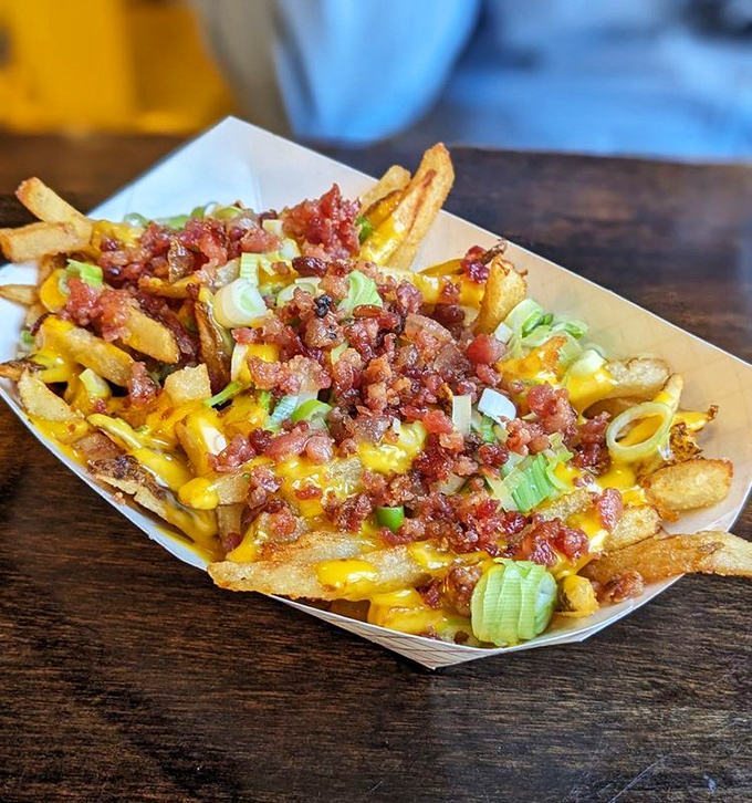 These loaded fries aren't just a side dish&mdash;they're a main event topped with enough cheese, bacon and green onions to make a potato proud.