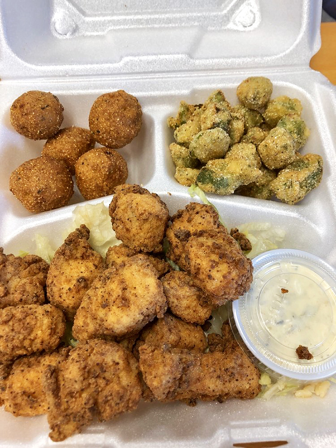 Seafood nirvana in a to-go container: golden-fried fish bites, hushpuppies, and fried okra that make styrofoam seem like fine china.