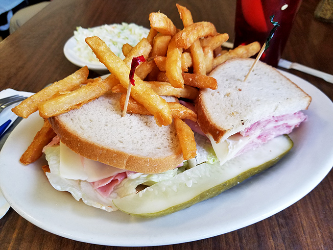 This sandwich isn't just stacked&mdash;it's architecturally significant. Those fries could make a potato weep with pride at what it became.