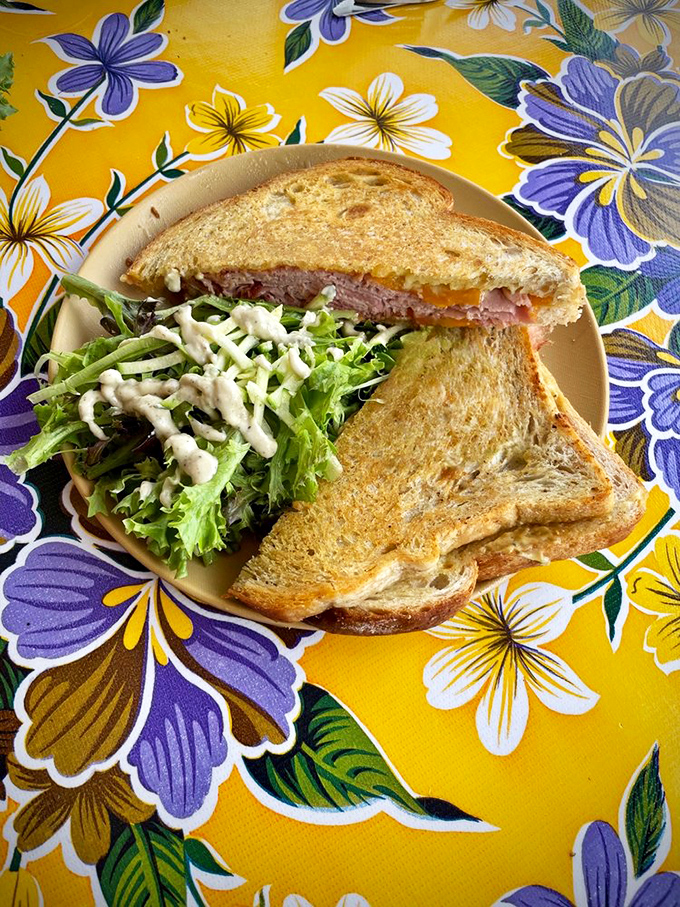 A sandwich that understands the perfect bread-to-filling ratio, with greens that actually contribute flavor rather than just fulfilling a vegetable obligation.