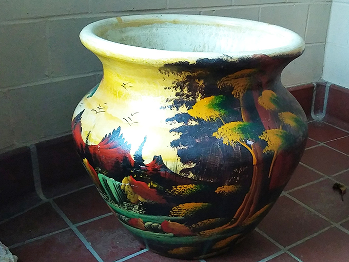 This hand-painted garden pot doesn't just hold plants – it holds stories. Imagine the conversations it could start on your patio!