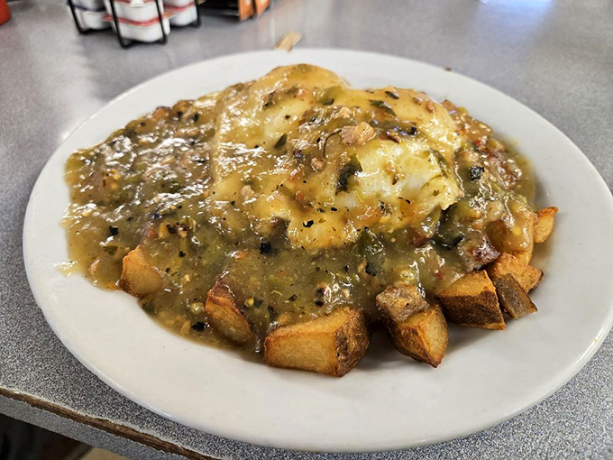Green chili: Colorado's answer to chicken soup for the soul, especially when it's smothering crispy potatoes and eggs.